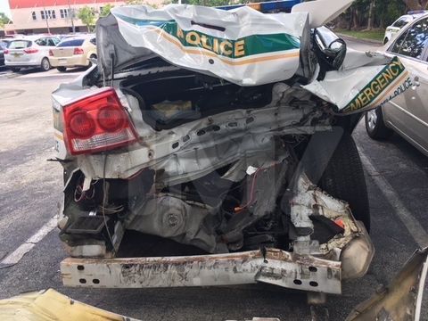 Justin Bieber Bodyguard -- The Cop Car Crash | Photo 1 | TMZ.com